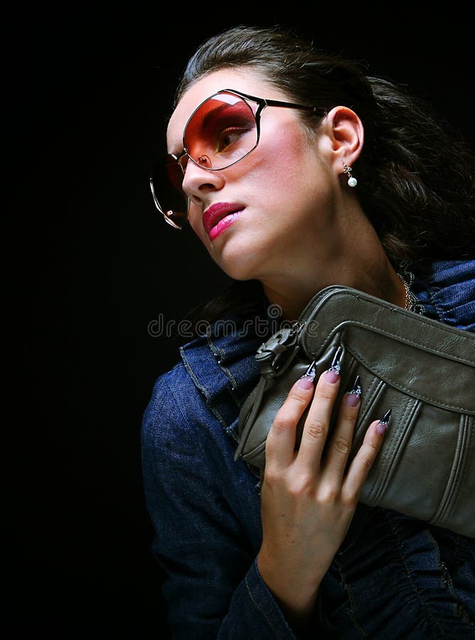 Fashion model with a bag stock photo. Image of clothing - 74011756