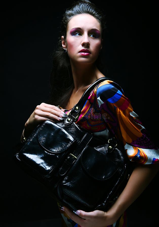 Fashion model with a bag stock image. Image of modeling - 74036219