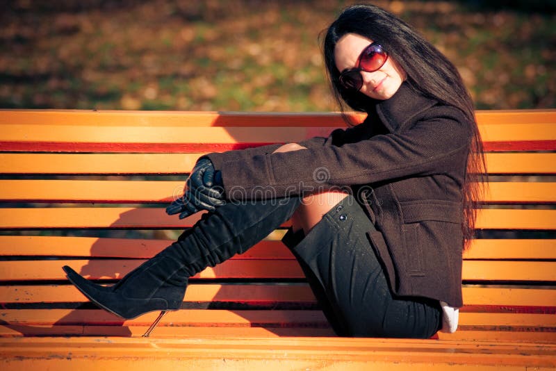 Fashion model on the bench stock image. Image of attractive - 7353593