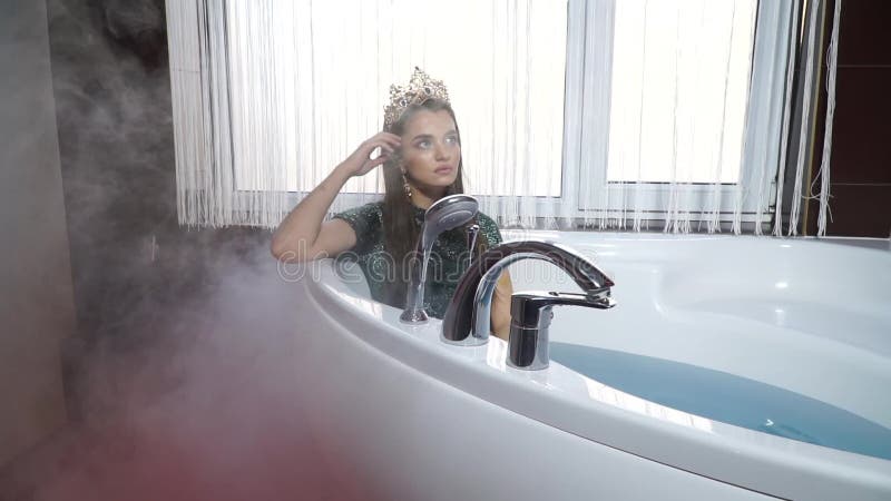 Fashion Model in a Jacuzzi in the Bathroom To Smoke Stock Video - Video ...