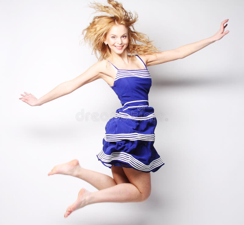 Fashion Model Jumps in Studio Stock Photo - Image of fashion, curly ...
