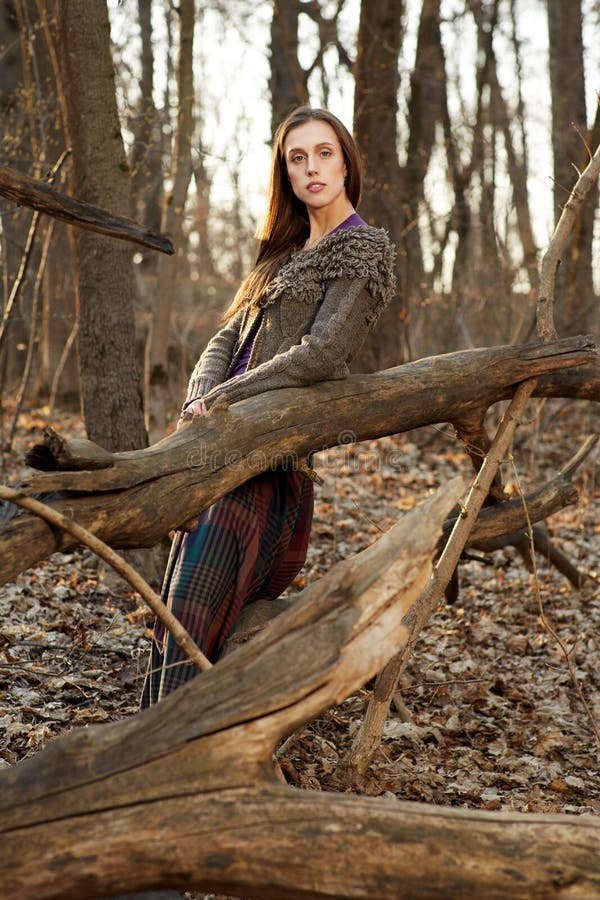 Fashion Model Outdoors in a Forest Stock Photo - Image of grass, model ...