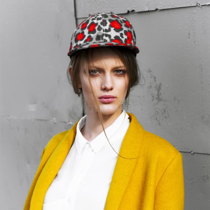 Fashion Model in Stylish Clothes Poses Outdoors Stock Photo - Image of ...