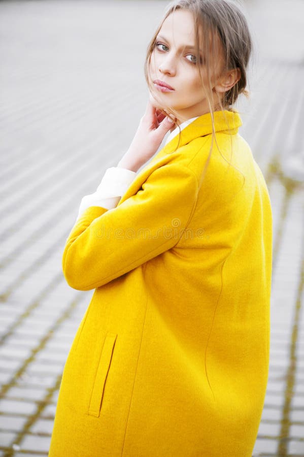 Fashion Model in Stylish Clothes Poses Outdoors Stock Photo - Image of ...