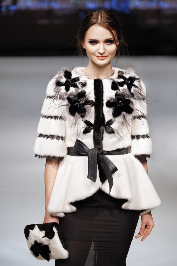 Fashion Model Walks on Runway in Fur Coat Stock Photo - Image of stage ...