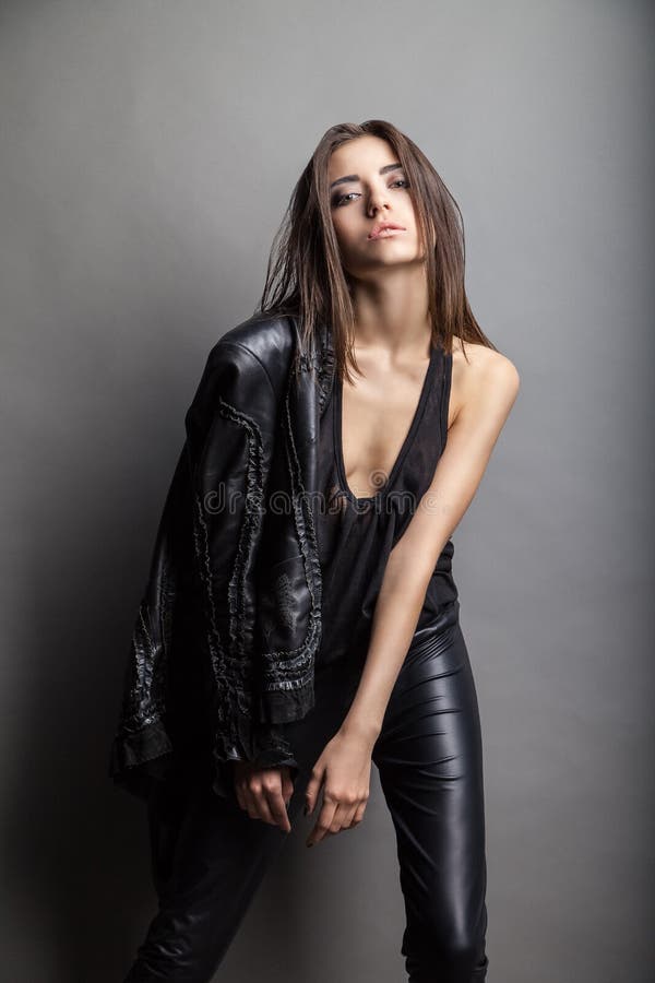 Fashion Model Wearing Leather Pants And Jacket Stock Photo - Image ...