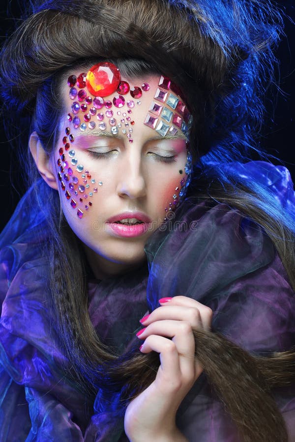 Model with Creative Make-up Blowing Soap Bubbles. Stock Image - Image ...