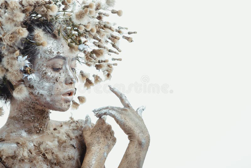 Fashion Portrait Of A Dark Skinned Girl With Silver Foil Make Up