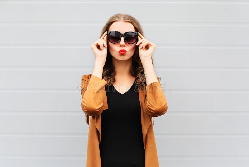 Fashion Portrait Pretty Woman Blowing Red Lips Making Kiss Wearing