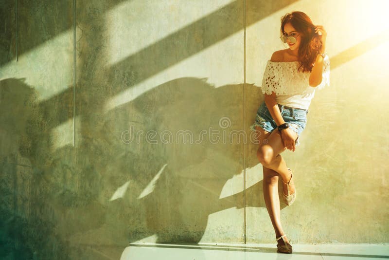 Fashion Portrait of Young Model Posing by the Wall Stock Photo - Image ...