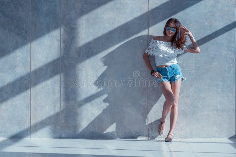 Fashion Portrait of Young Model Posing by the Wall Stock Photo - Image ...