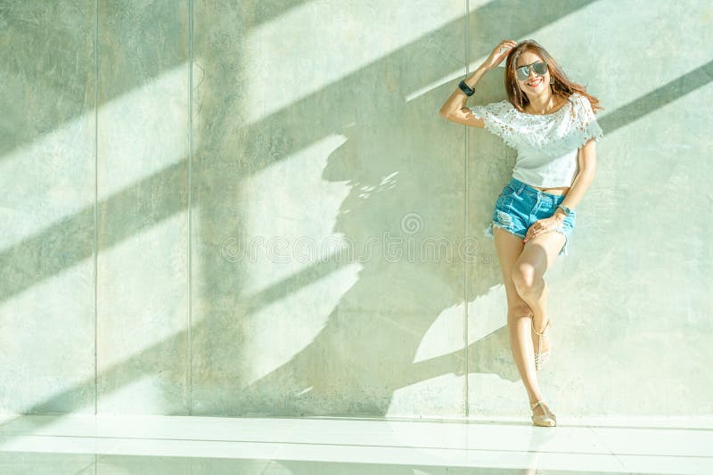 Fashion Portrait of Young Model Posing by the Wall Stock Photo - Image ...