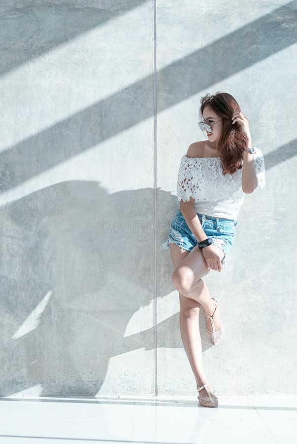 Fashion Portrait of Young Model Posing by the Wall Stock Image - Image ...