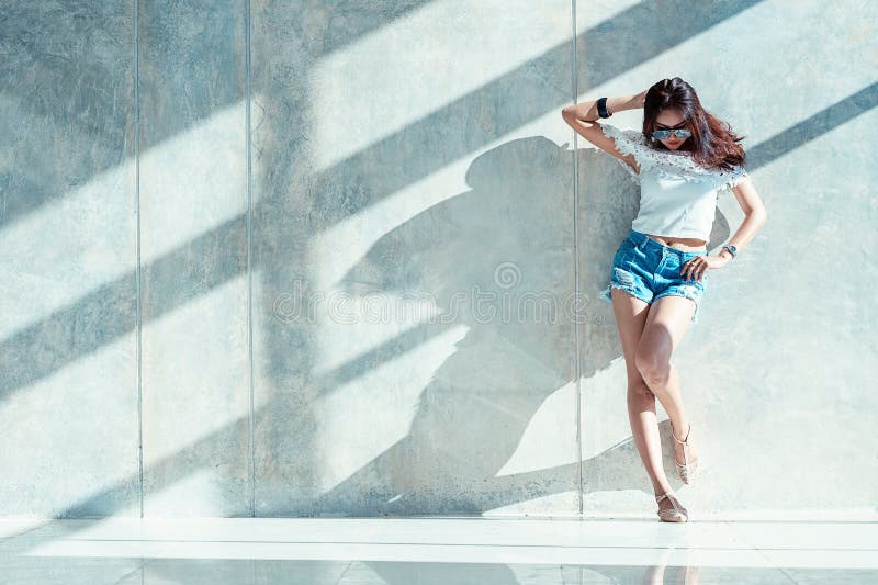 Fashion Portrait of Young Model Posing by the Wall Stock Photo - Image ...