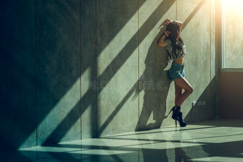 Fashion Portrait of Young Model Posing by the Wall Stock Photo - Image ...