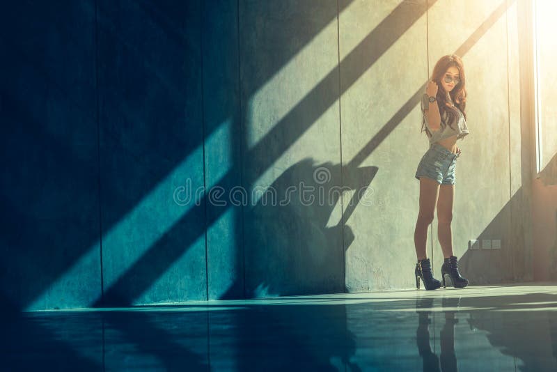 Fashion Portrait of Young Model Posing by the Wall Stock Image - Image ...