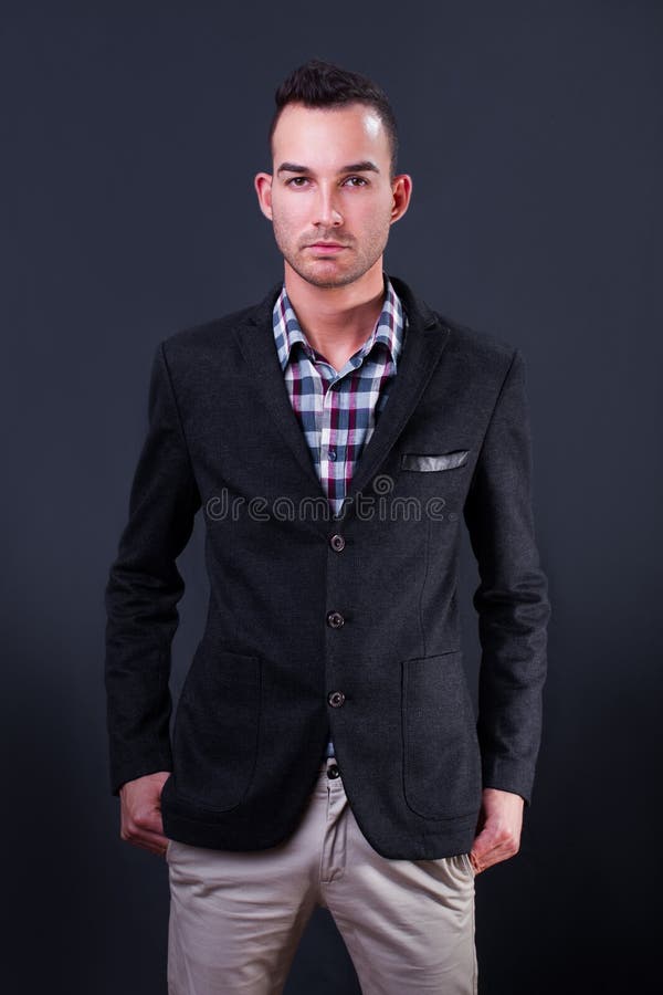 Fashion Shot of a Young Man Stock Image - Image of modern, dark: 33652145