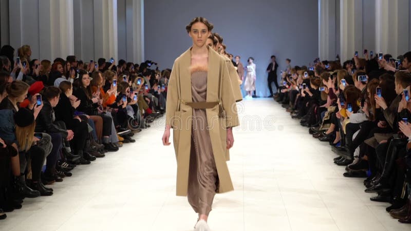 Fashion Show. Group of Models Walking on the Catwalk. Slow Motion Stock ...