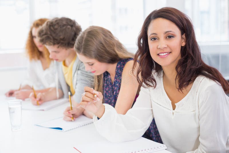 Fashion Students Smiling at Camera in Class Stock Photo - Image of ...