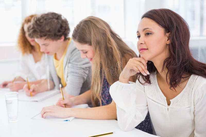 Fashion Students Taking Notes in Class Stock Image - Image of mixedrace ...