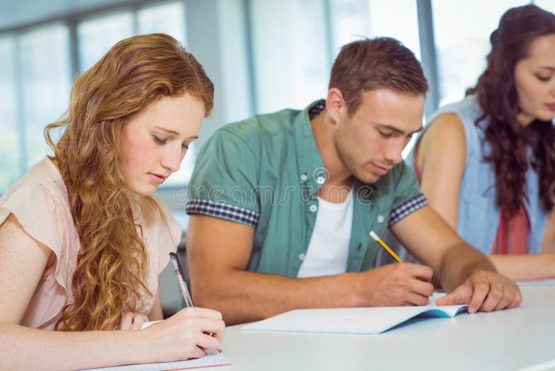 Fashion Students Taking Notes in Class Stock Photo - Image of academic ...