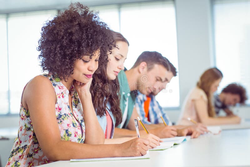 Fashion Students Taking Notes in Class Stock Photo - Image of caucasian ...