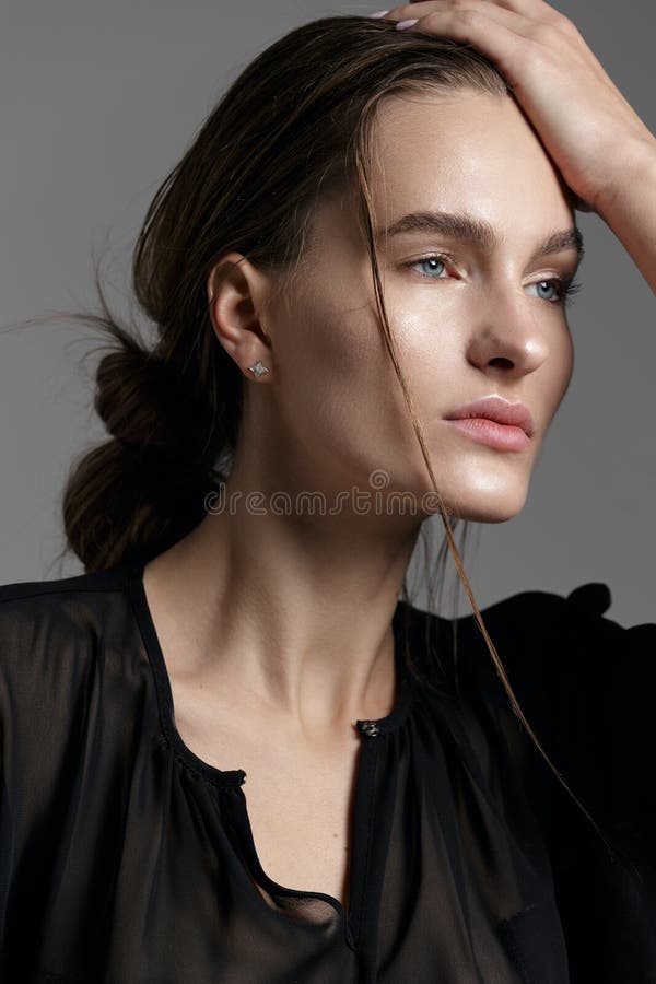 Fashion Style Model in Black Shirt and Pants Posing in the Studio Stock ...