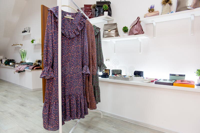 Fashion Winter Coats Hanged on a Clothes Rack Stock Photo - Image of ...