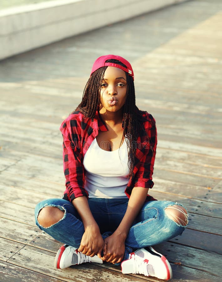 Fashion Young African Woman Sitting Having Fun City Wearing Red