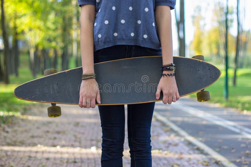 Fashion Young Woman Posing with a Longboard Stock Photo - Image of ...