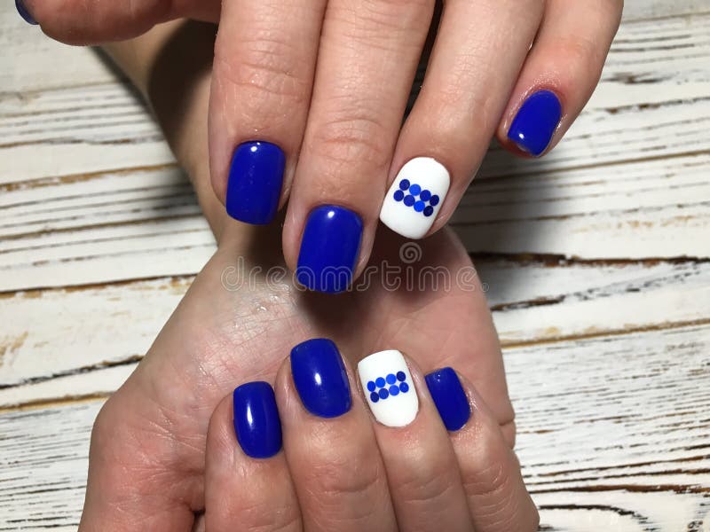 Fashionable blue manicure stock photo. Image of blue - 125213660