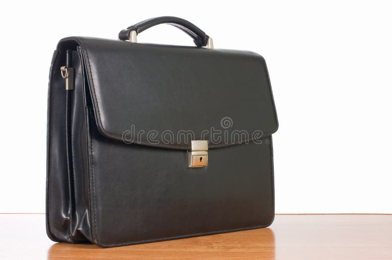 Fashionable Leather Briefcase on a Table Stock Image - Image of side ...