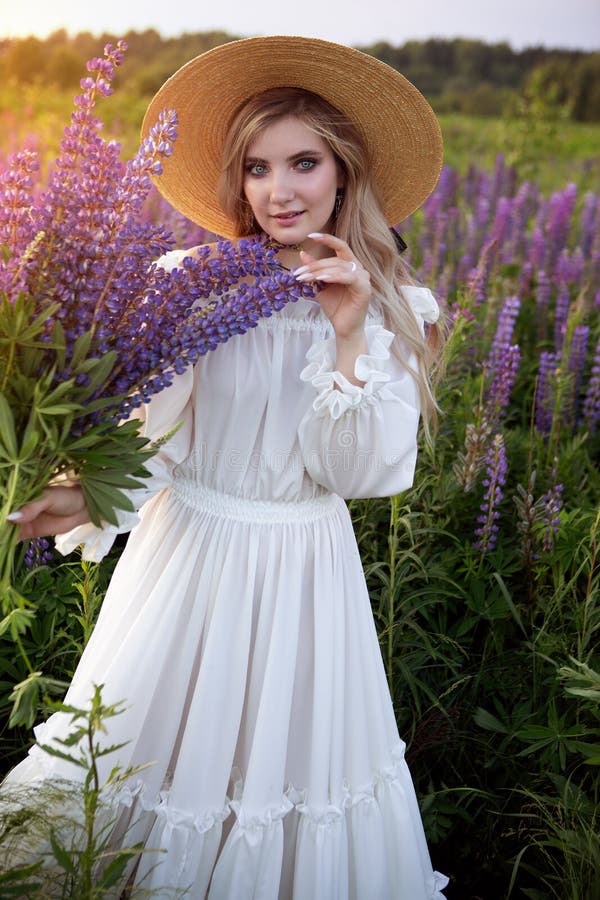 A Fashionable Photo Of A Beautiful Girl With Blonde Hair In Elegant