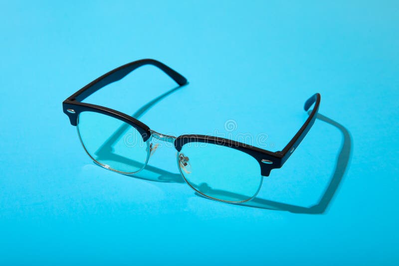 Retro Eyeglasses on a Blue Background Stock Photo - Image of retro ...