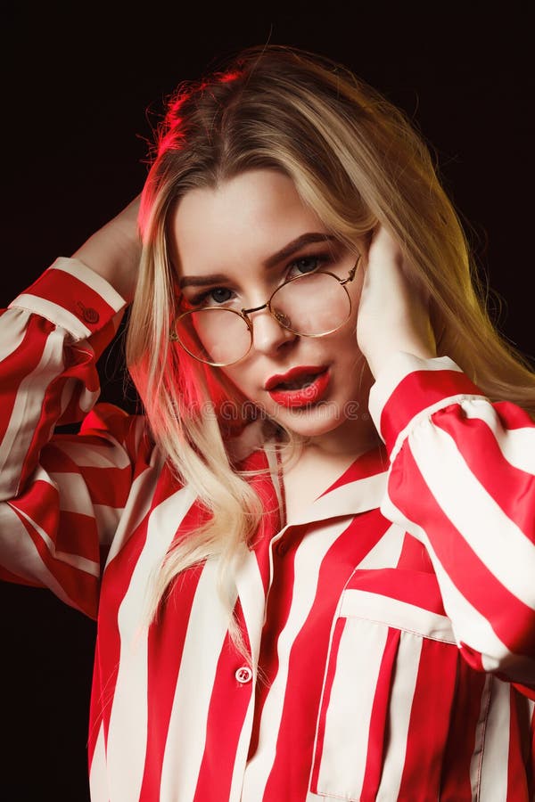 Fashionable Blonde Woman With Red Lips Wearing Glasses Posing W Stock