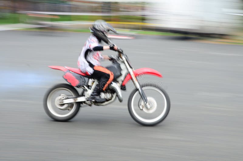 Fast biker stock image. Image of blur, helmet, blurry - 26523425