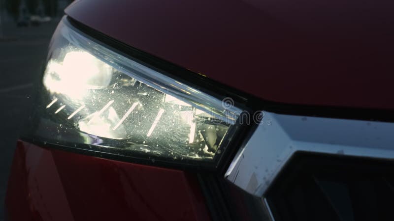 A Fast Blinking Turn Signal or Blinker of a Red Car in the Evening ...