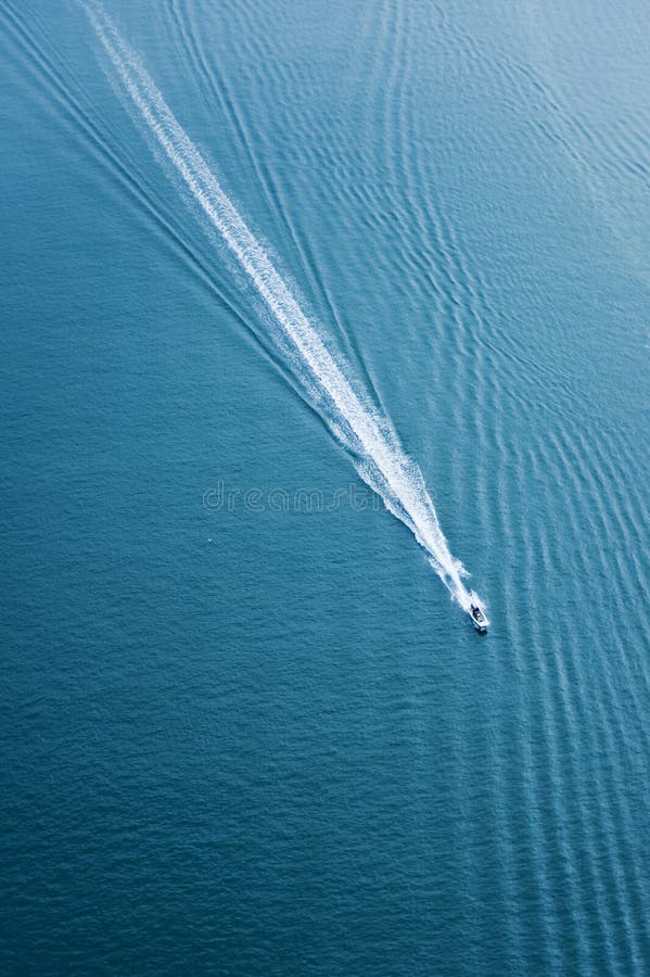 Boat moving at sunset stock image. Image of wake, moving - 55123735