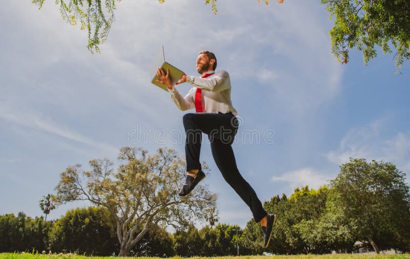 Fast Business Concept. Running Business Man with Laptop. Stock Photo ...