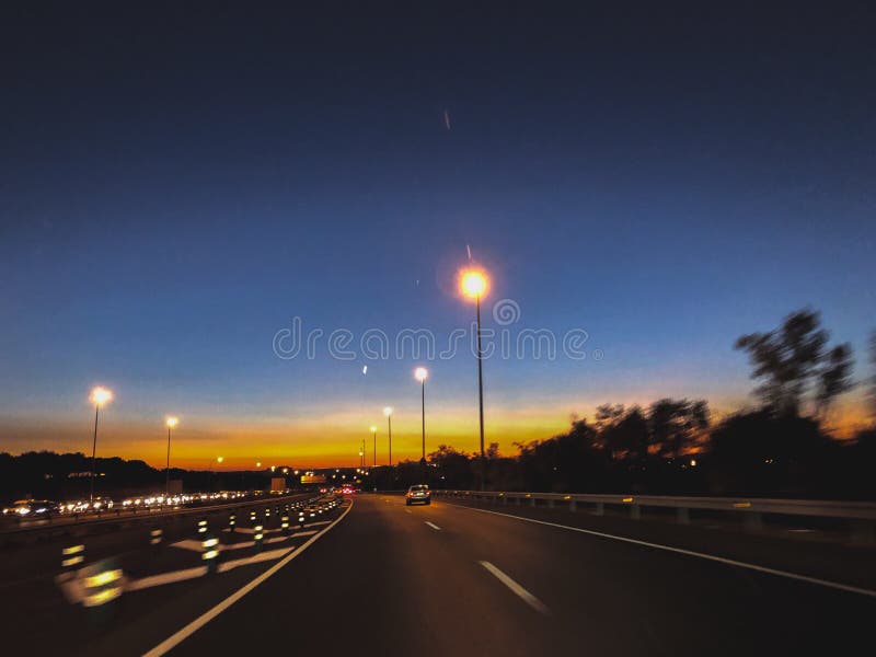 Fast car on the highway . stock image. Image of sunset - 142733231