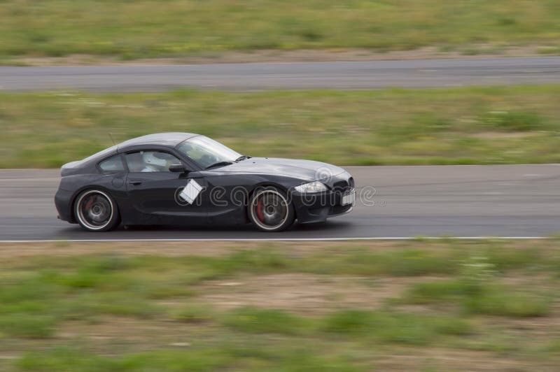 Fast car in a race stock photo. Image of black, motorized - 20324372
