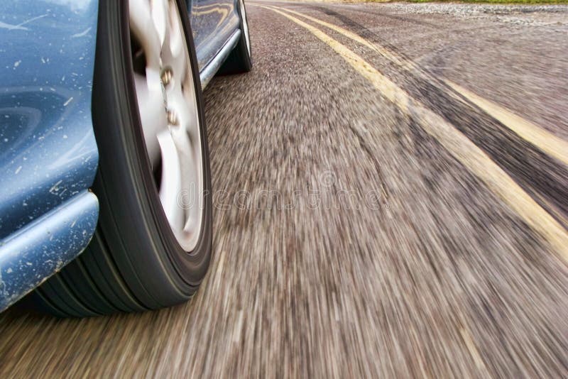Fast Car Wheel Speeding on a Country Road Stock Image - Image of chase ...