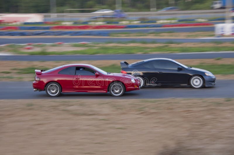 Fast cars in a race stock photo. Image of path, dirt - 20243554