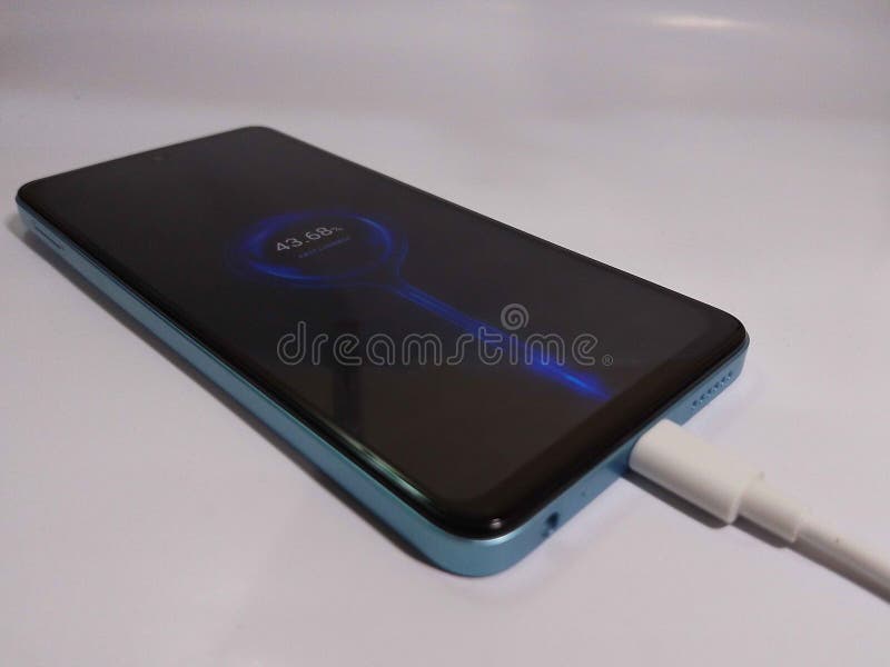 Fast Charging, Blue Phone Being Charged Stock Image - Image of phone ...