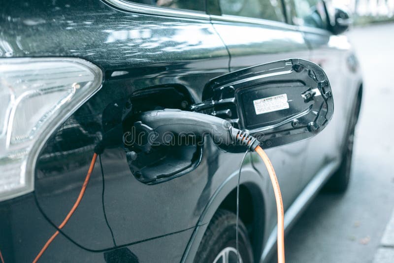 Fast Charging Electric Car in the City Stock Image - Image of charger ...