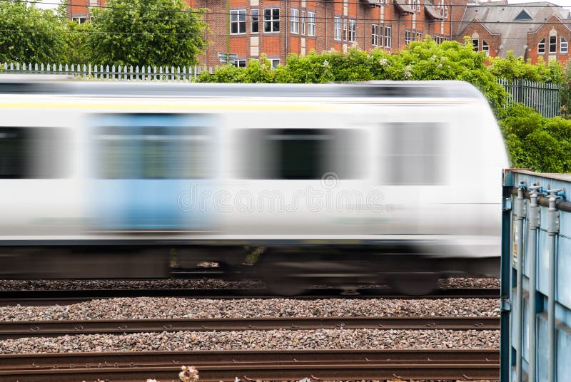 Fast Commuter Train Passing by during Rush Hour Stock Image - Image of ...