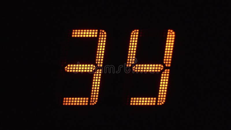 Fast Digital Countdown in Orange Numbers on an Electronic Display from ...