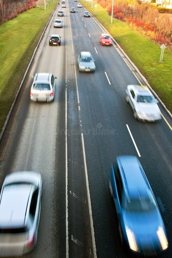 Fast driving cars on road stock photo. Image of motion - 17987910