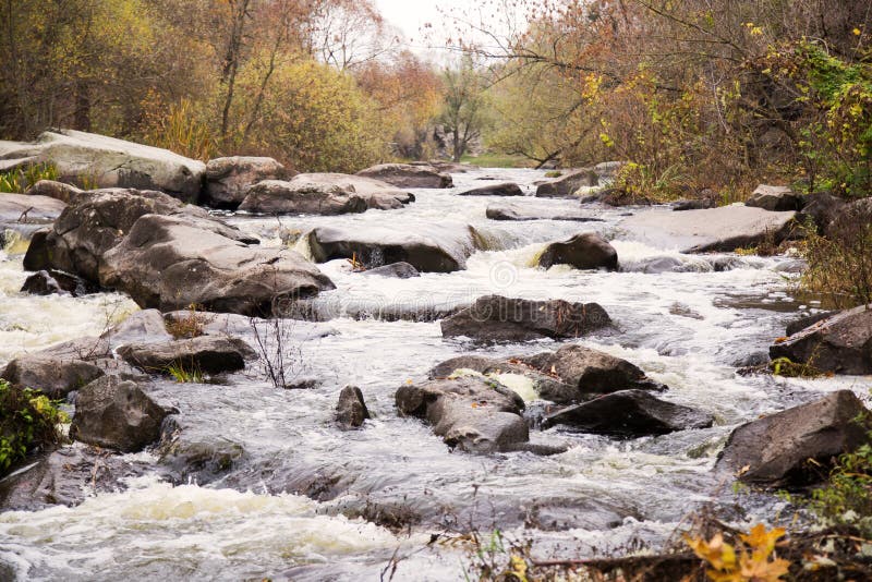 Fast Flow. the River Flows Fast among the Stones. Foamy River in the ...