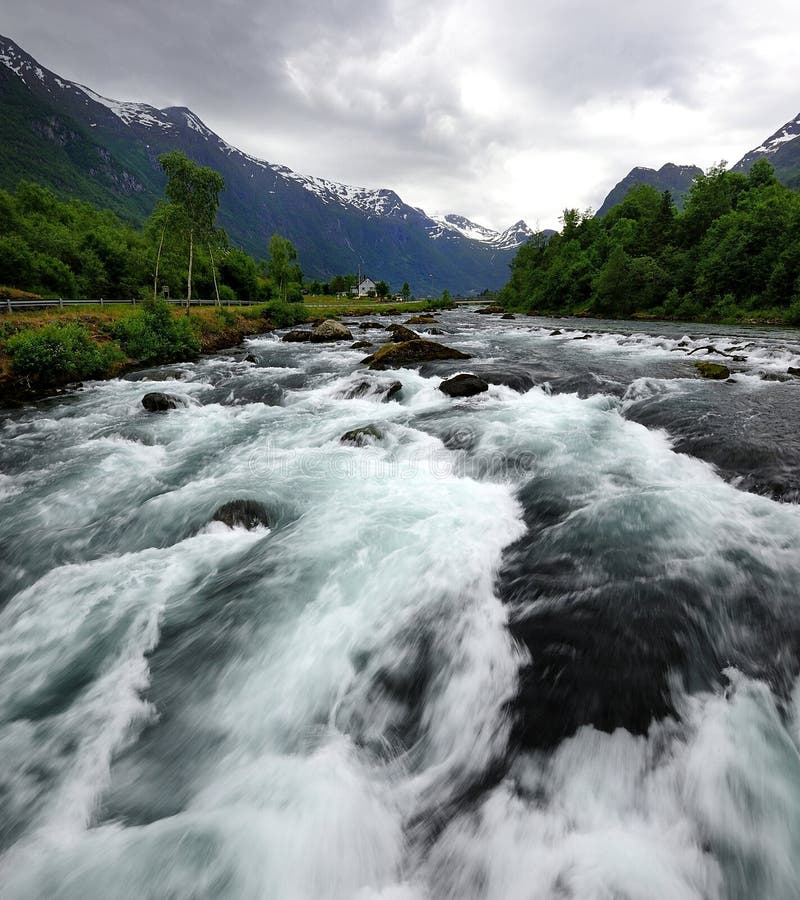 Fast flowing rapids stock image. Image of river, rapids - 76084141